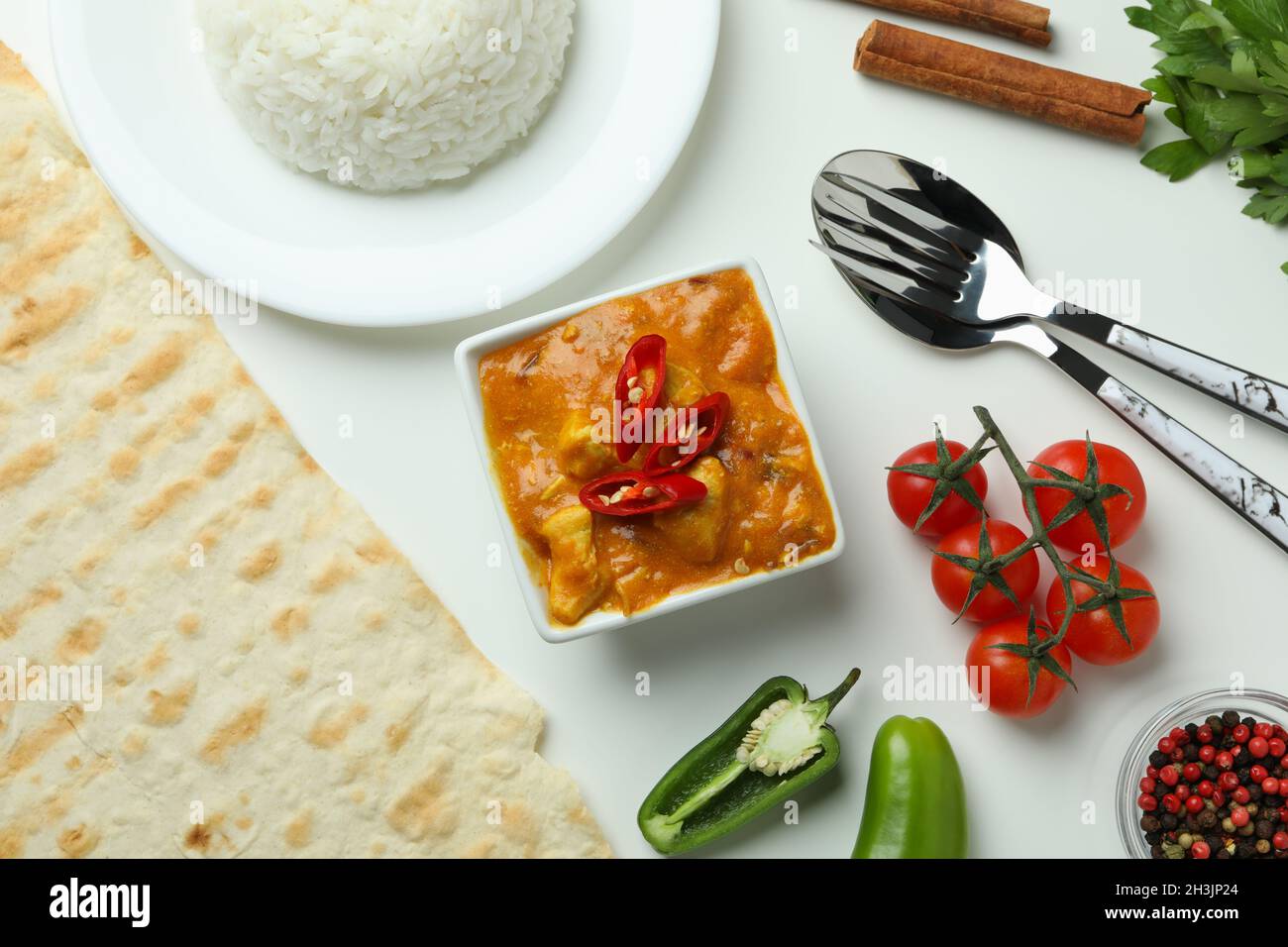 Concept of tasty food with chicken tikka on white background Stock ...