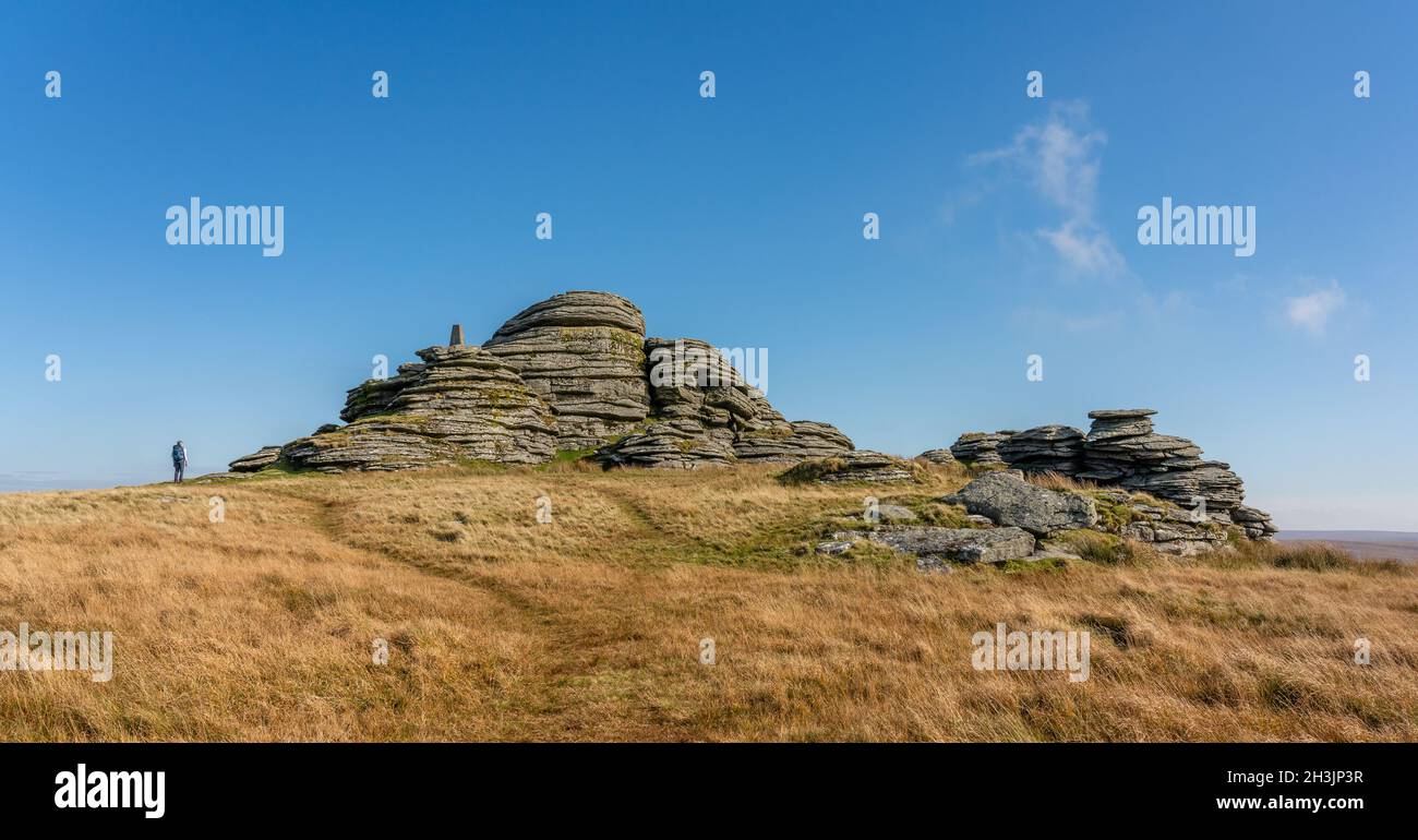 Walker approaching Great LInks Tor with its prominent Trig Point on ...