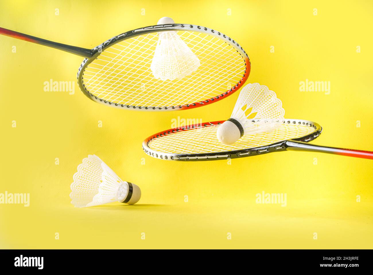 Summer sport activity concept. Two badminton paddle rackets with ...