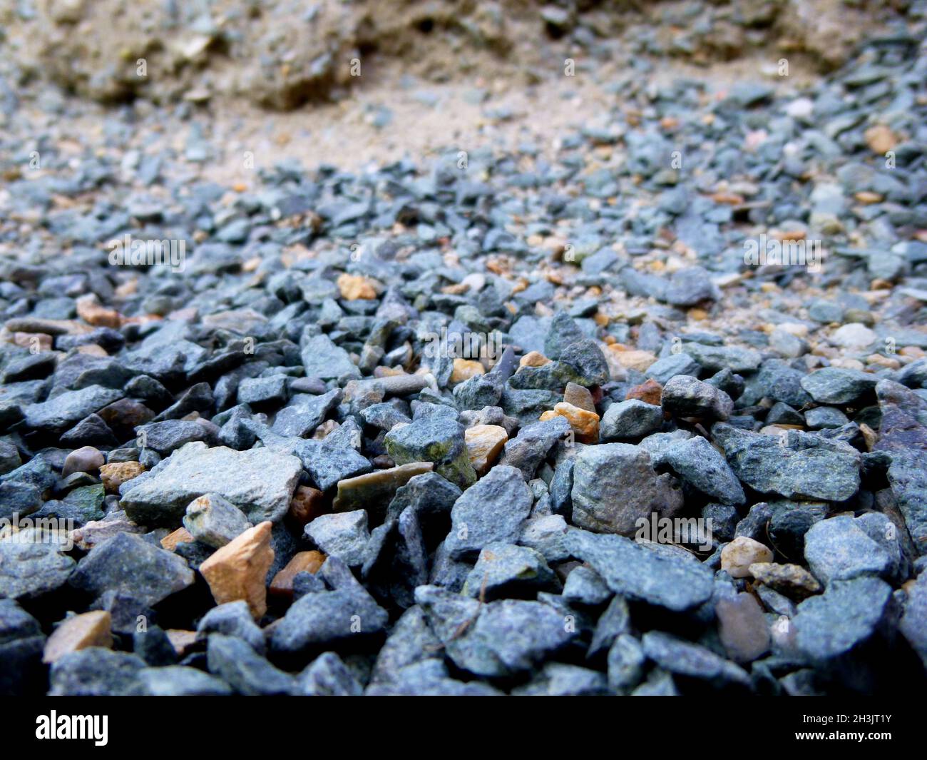 Grey ground stone rubble background of many small stones Stock Photo ...