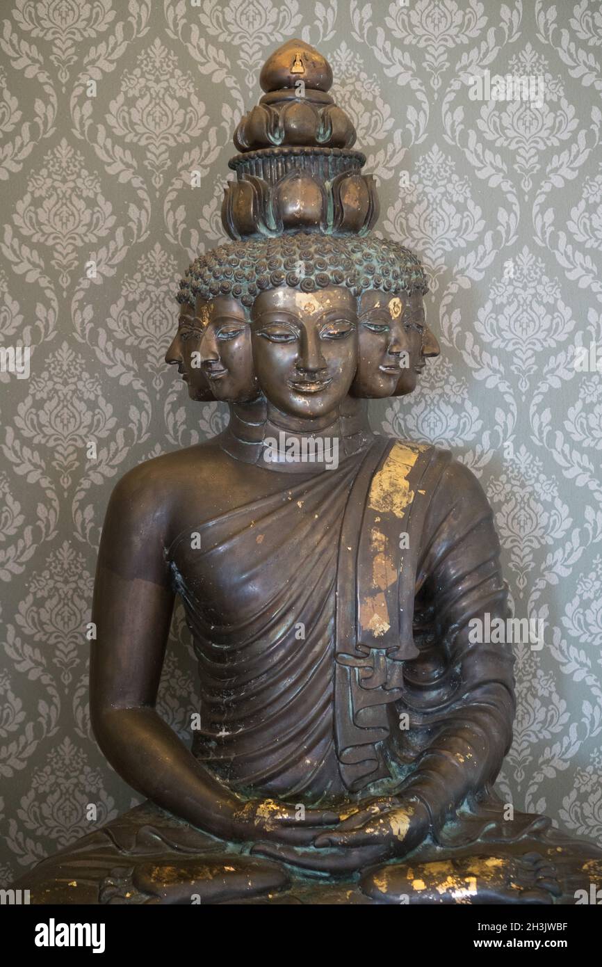 Golden statue of Buddha with many faces. Golden Mount temple, Bangkok ...