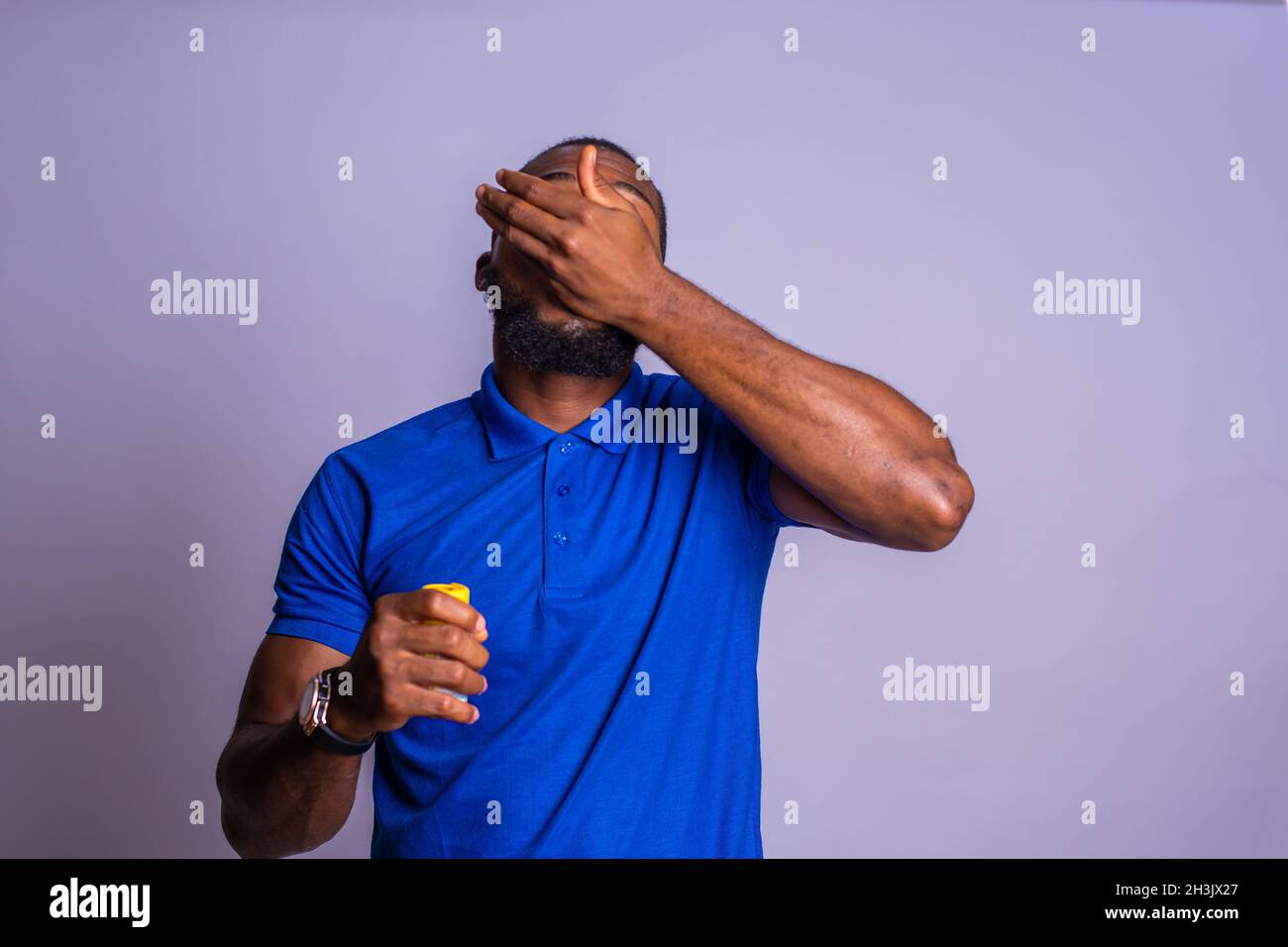 young black man taking his medication Stock Photo - Alamy