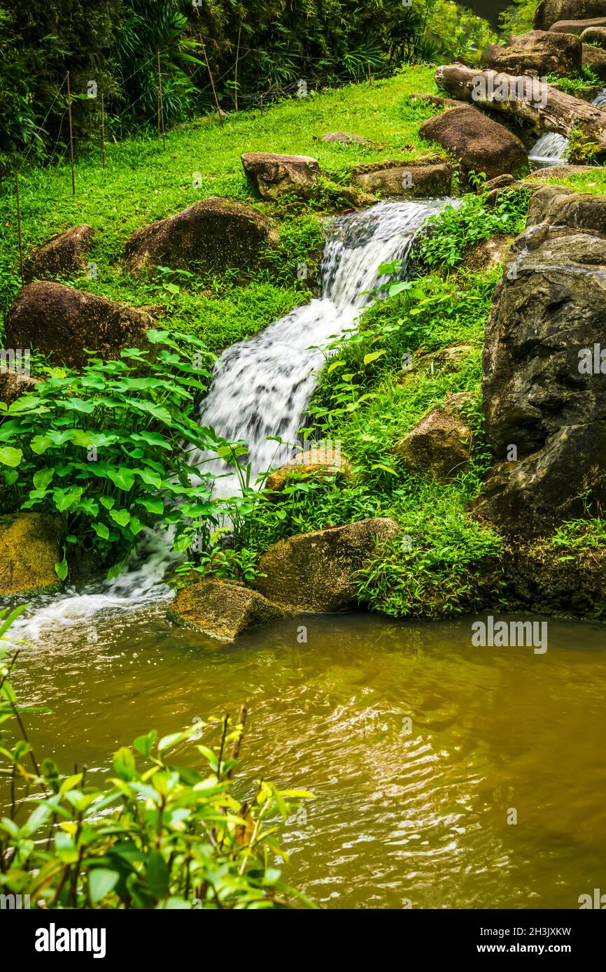 Beautiful waterfall in natural sitting Stock Photo - Alamy