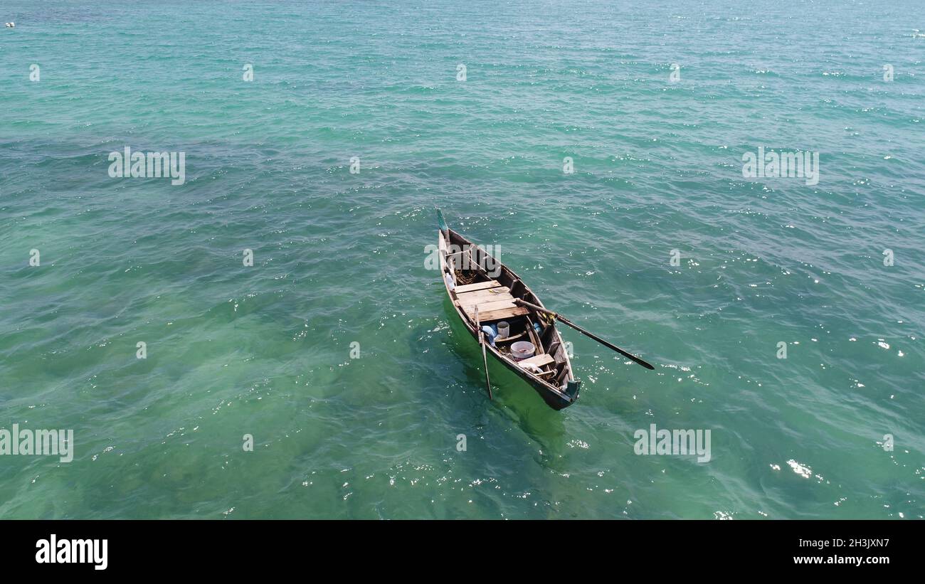 Boat floating on the sea Stock Photo - Alamy