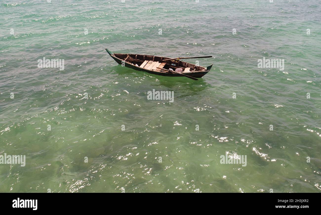 Boat floating on the sea Stock Photo - Alamy