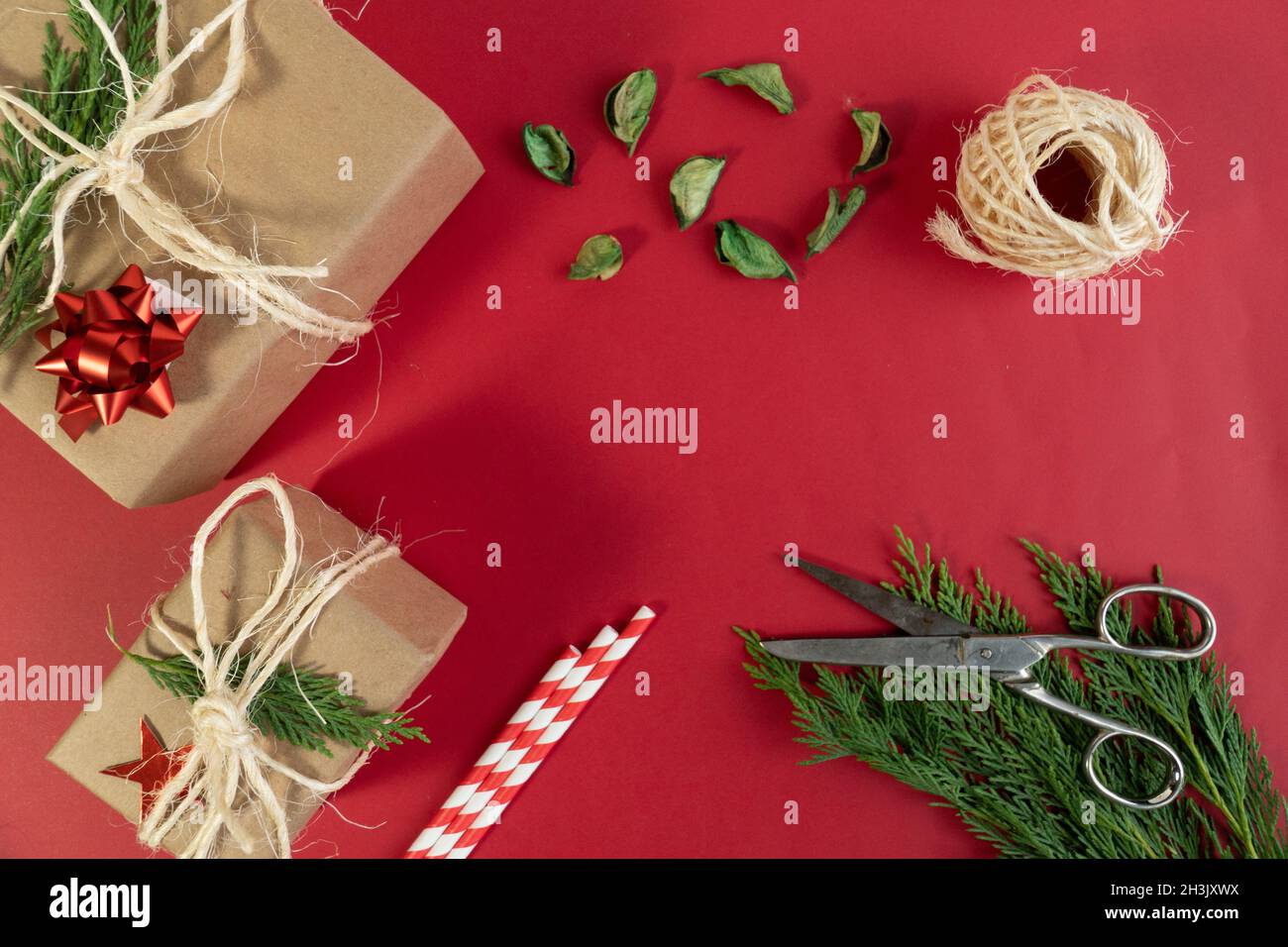 Top view noel gift boxes with straw rope and leaf, noel concept idea ...
