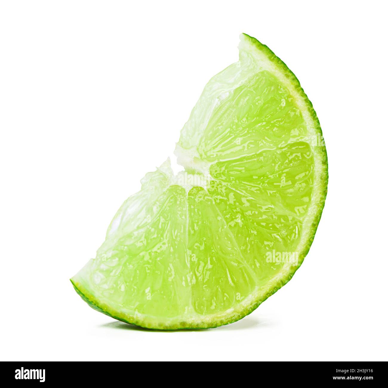 Pieces of lime isolated on white background Stock Photo - Alamy