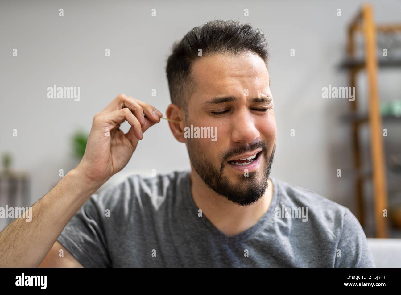 Ear cleaning hi-res stock photography and images - Alamy