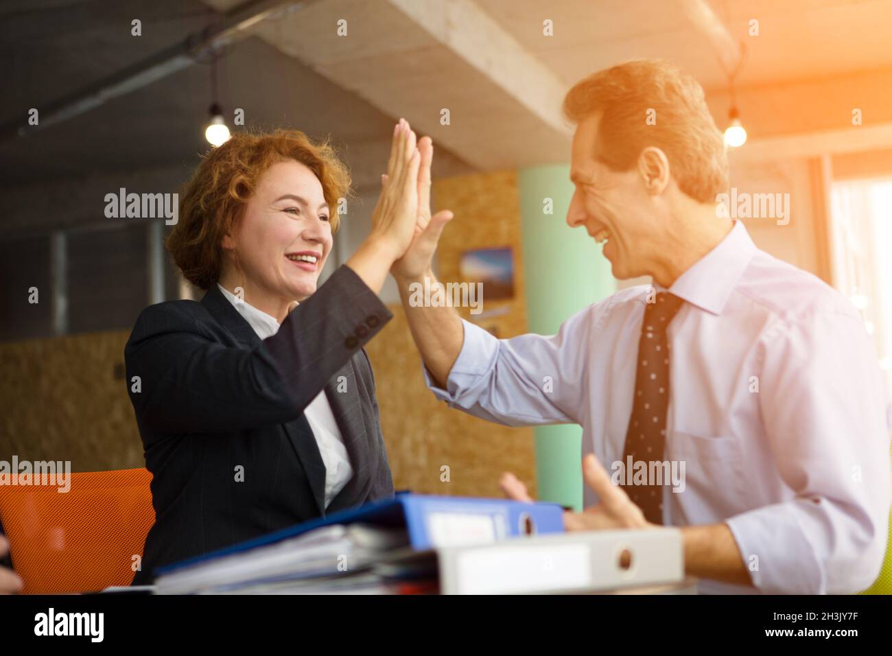 Happy employees hi-res stock photography and images - Alamy