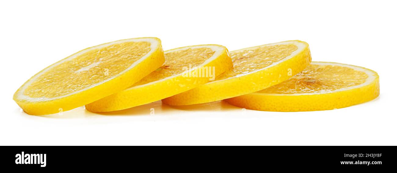 Cut lemon slice isolated on white background Stock Photo - Alamy