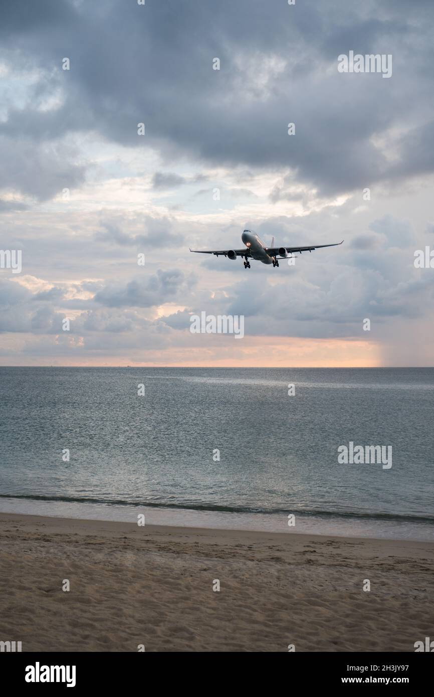 Wing of aeroplane over ocean island hi-res stock photography and images ...