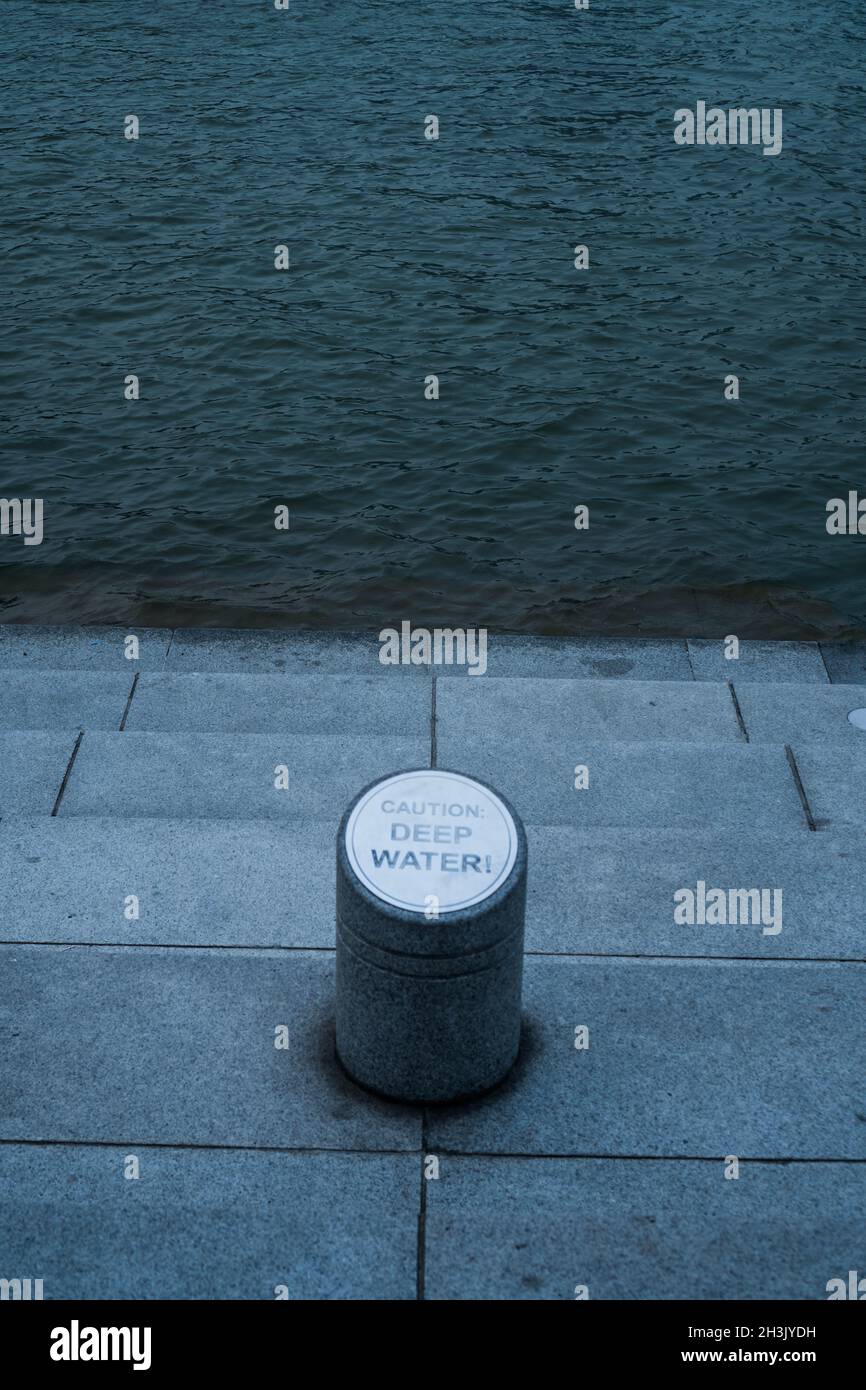 Deep water caution sign Stock Photo - Alamy