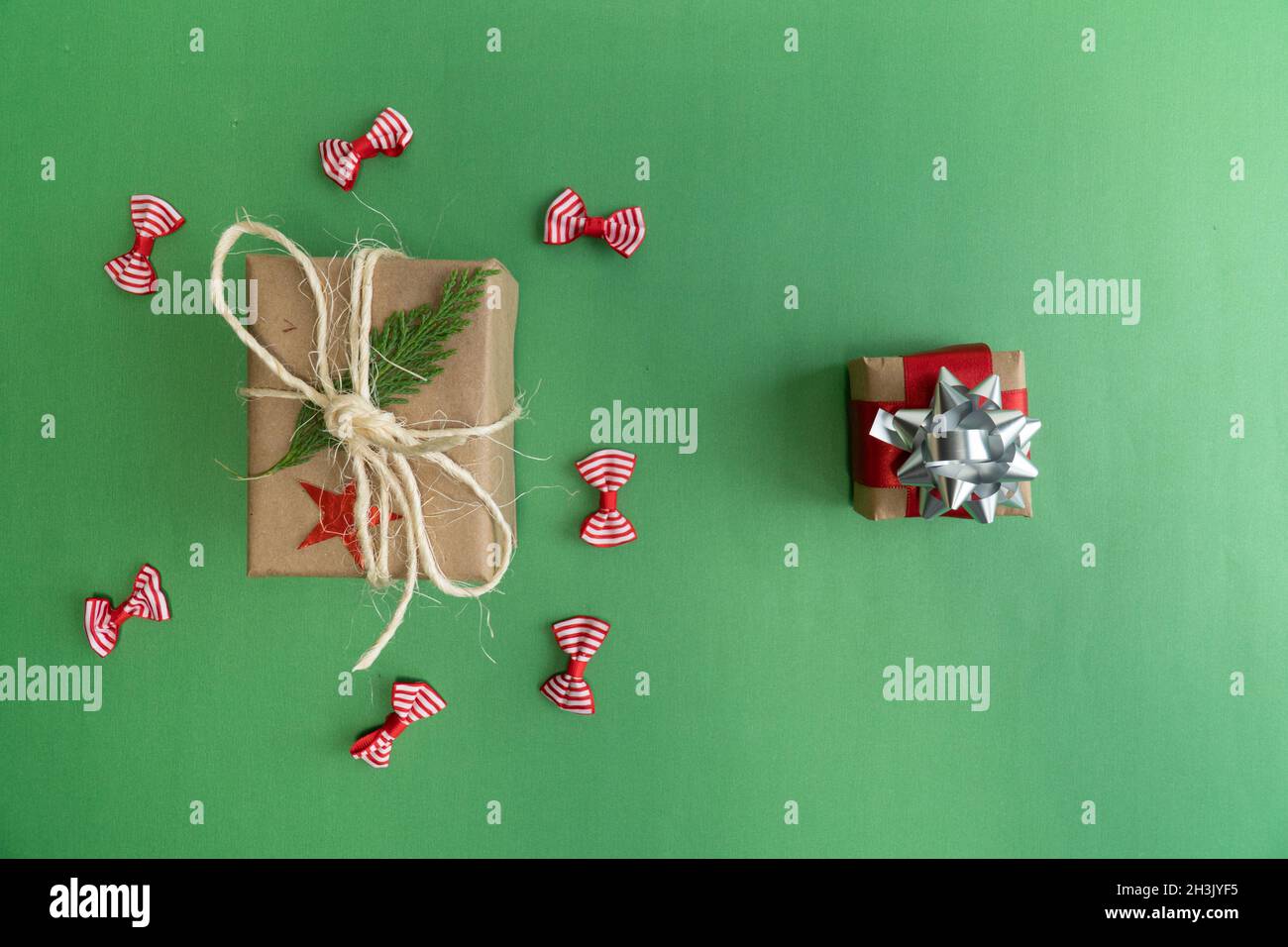 Noel gift box, two noel gift boxes on green background, top view ...