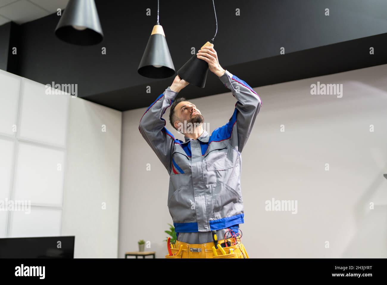 Home Ceiling Light Equipment Maintenance. Professional Electrician ...