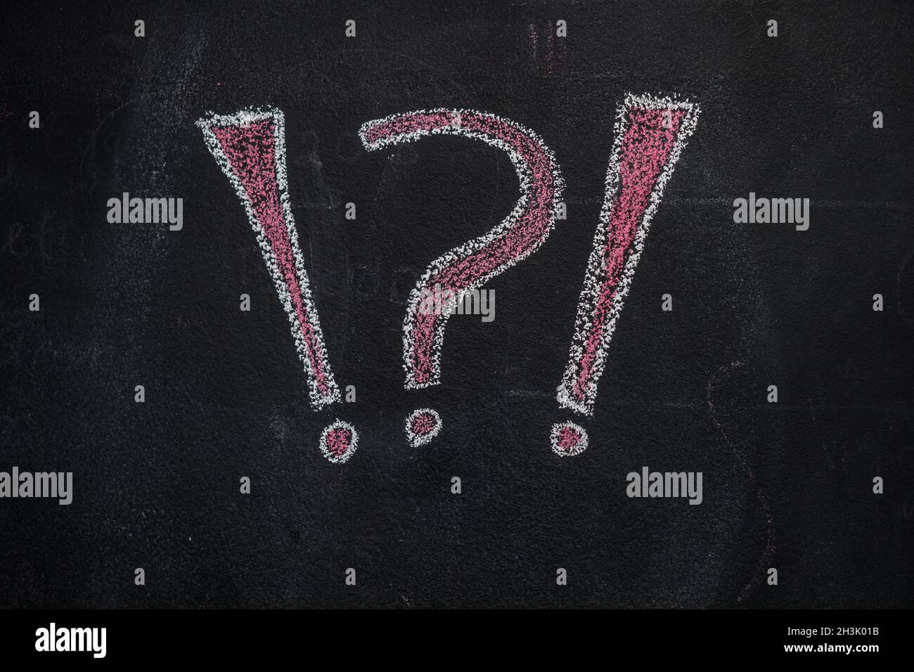 Question and exclamation marks on black chalkboard Stock Photo - Alamy