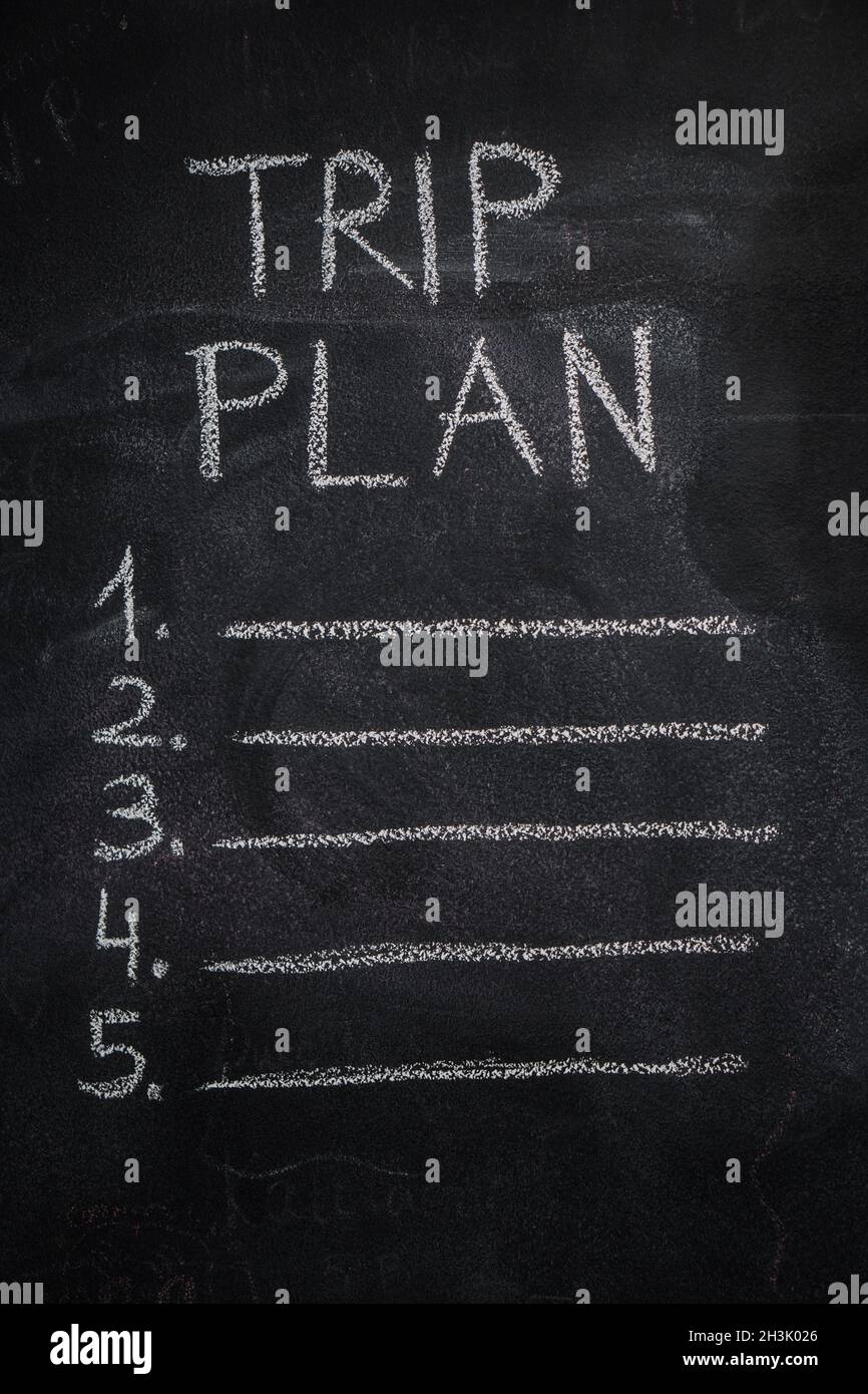 Trip plan list on black chalkboard Stock Photo - Alamy