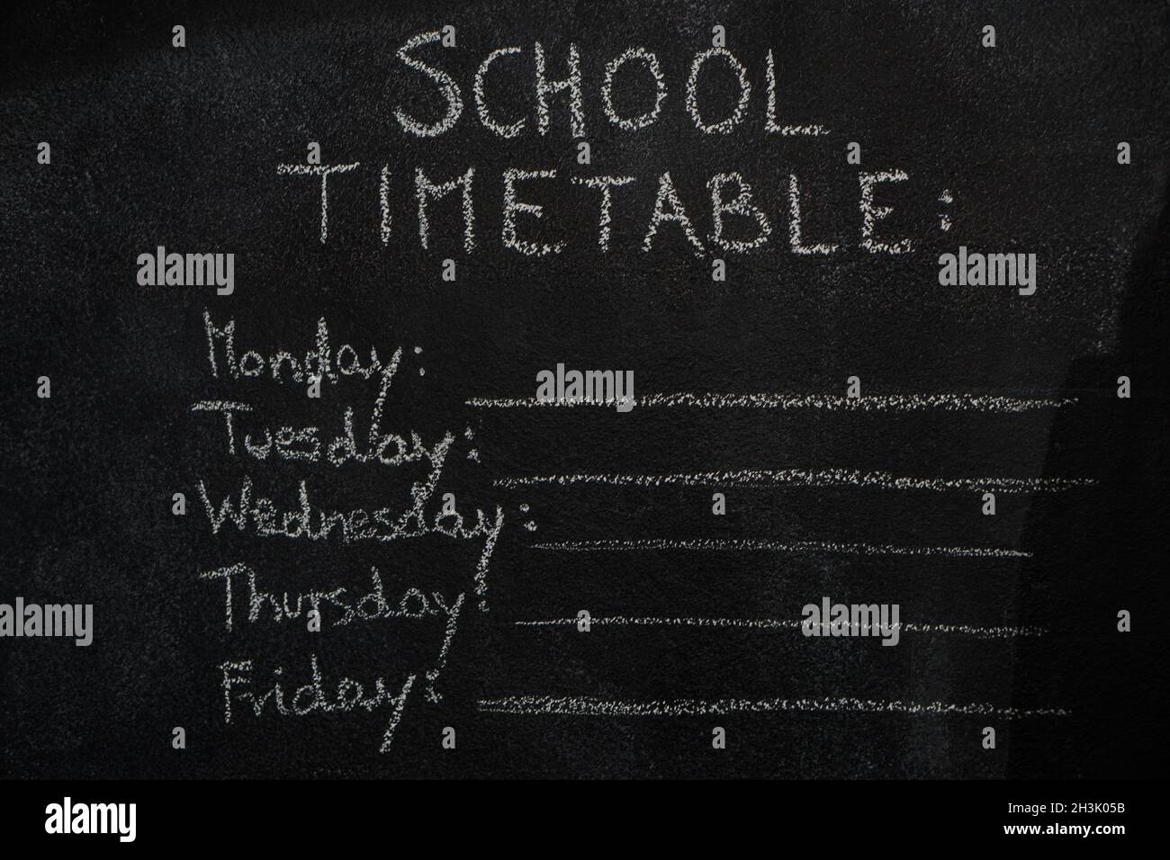 School timetable drawn on black chalkboard Stock Photo - Alamy