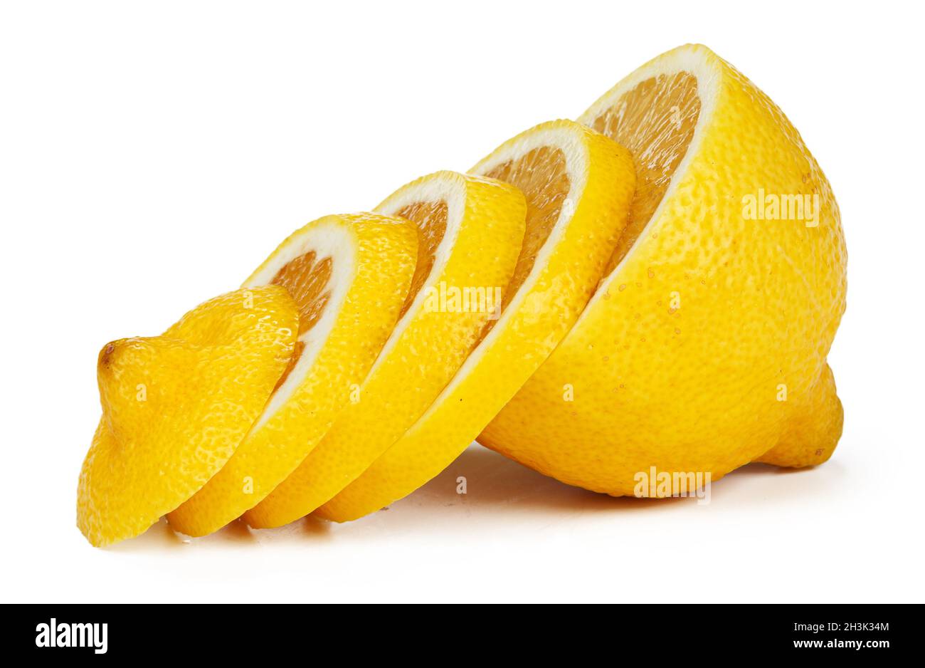 Cut lemon slice isolated on white background Stock Photo - Alamy