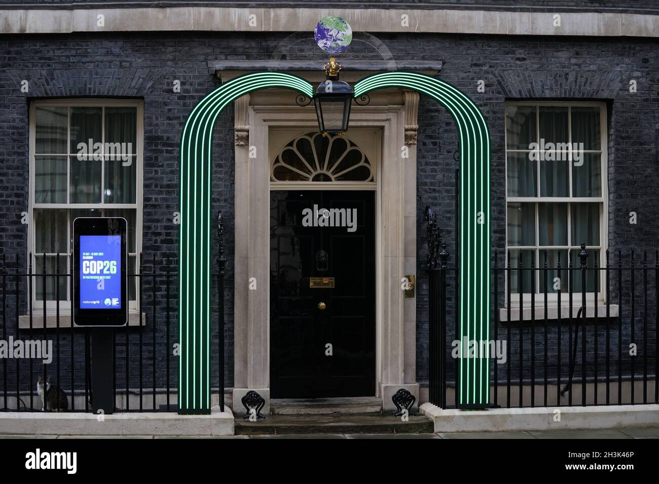 The famous 10 Downing Street doorway being lit up in green ahead of the ...