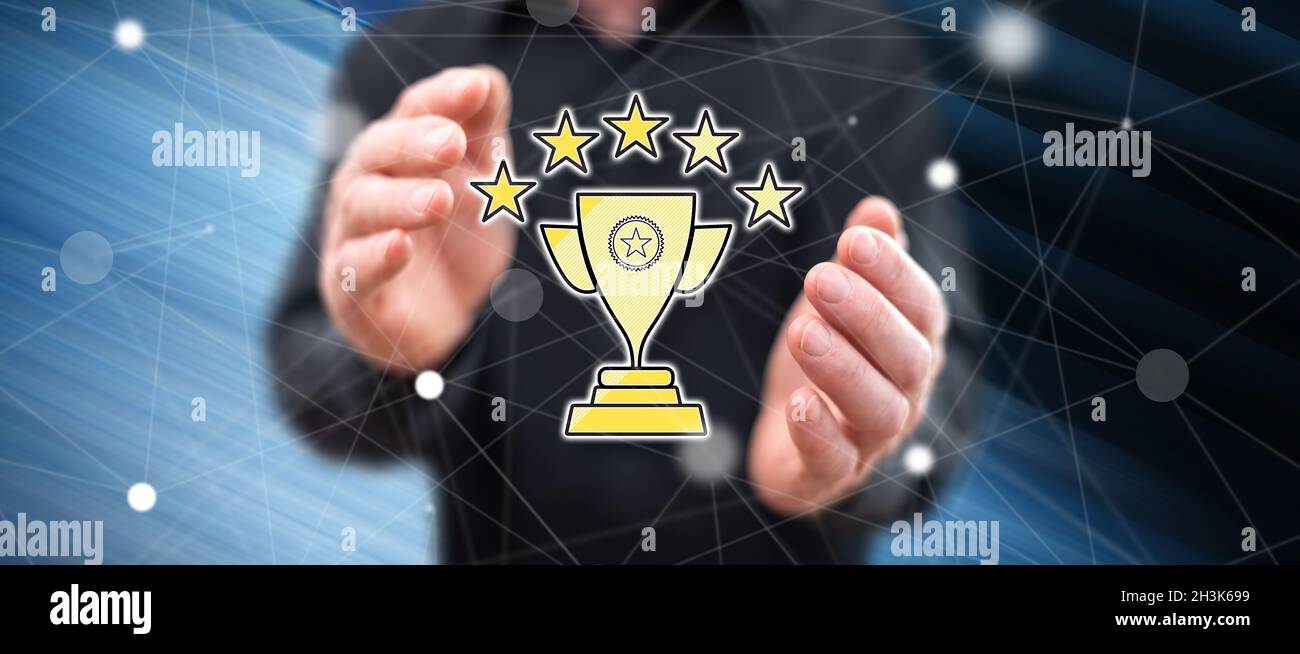 Quality champion concept between hands of a man in background Stock ...