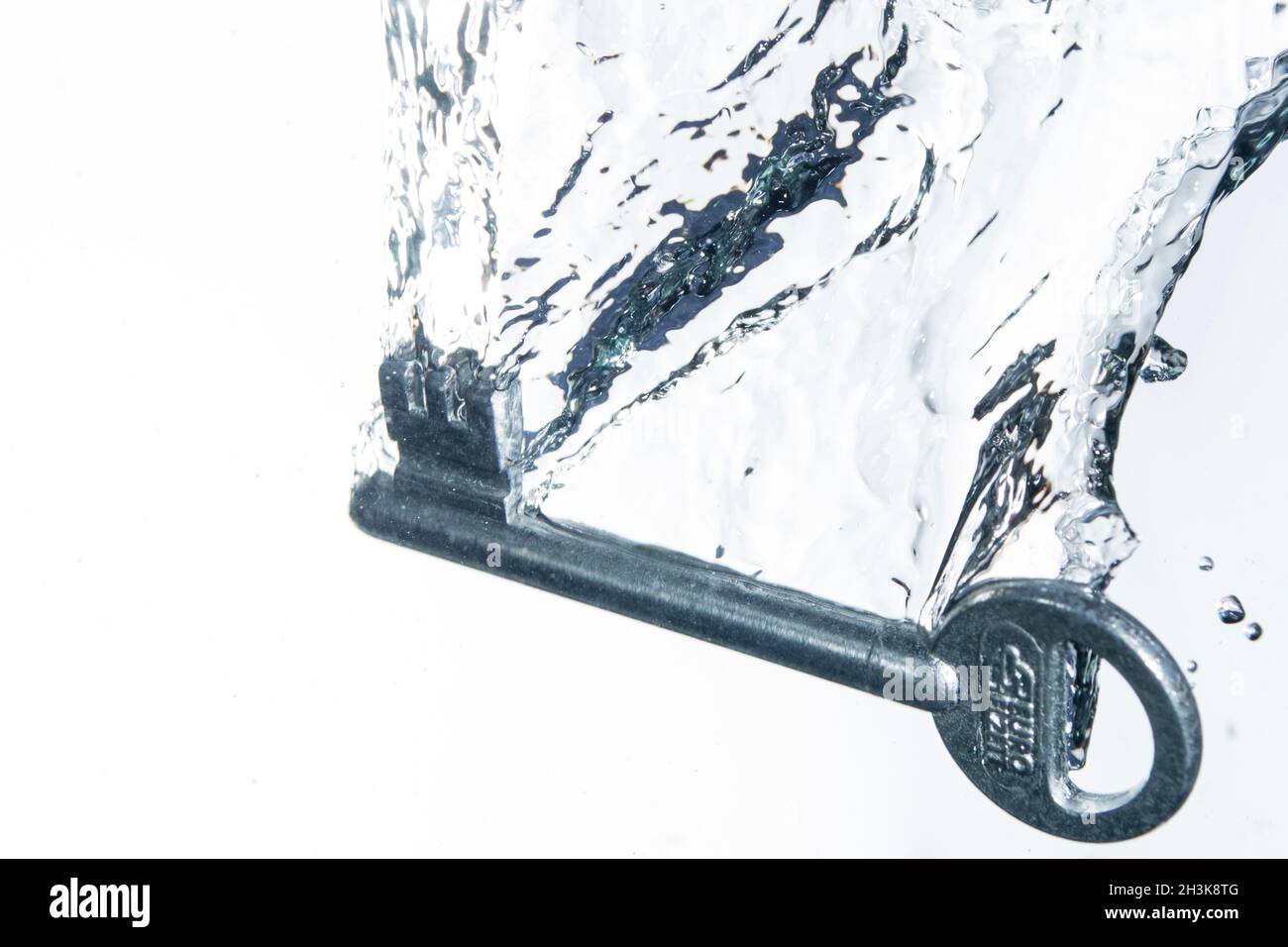 key that falls into water Stock Photo - Alamy
