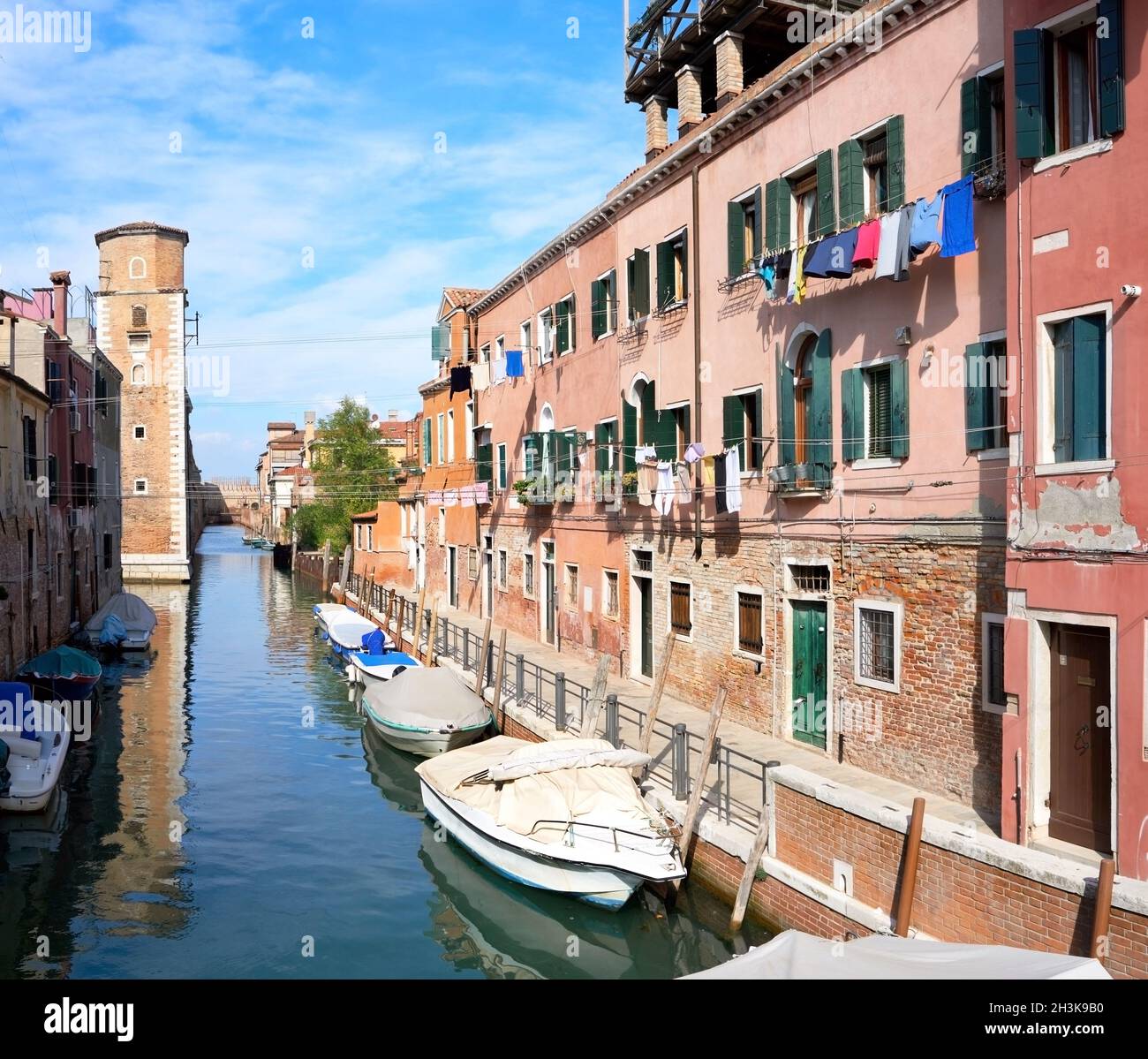 Washing lines along canal in Venice, Italy. Laundry hanging on a ...