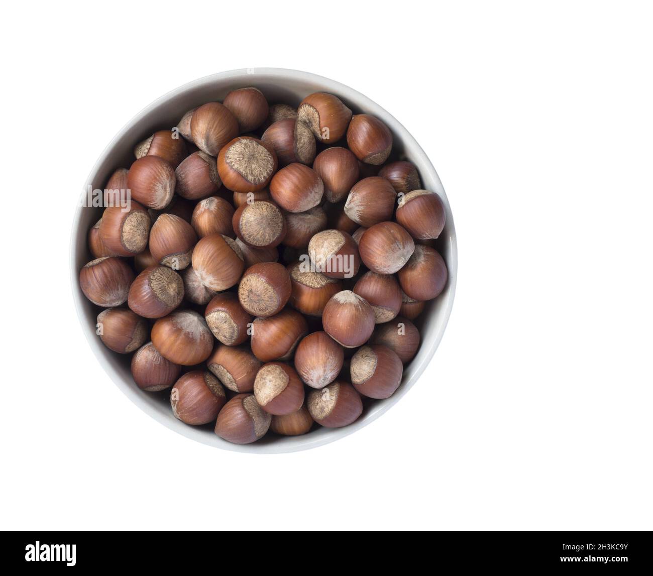 Full bowl of hazelnuts isolated on white background, top view Stock ...