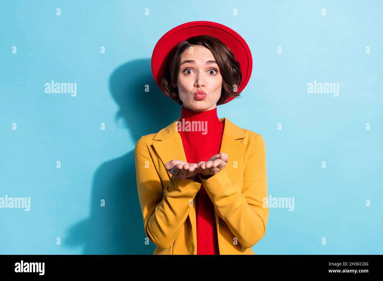 Photo of young attractive girl pouted lips send air kiss you romance ...