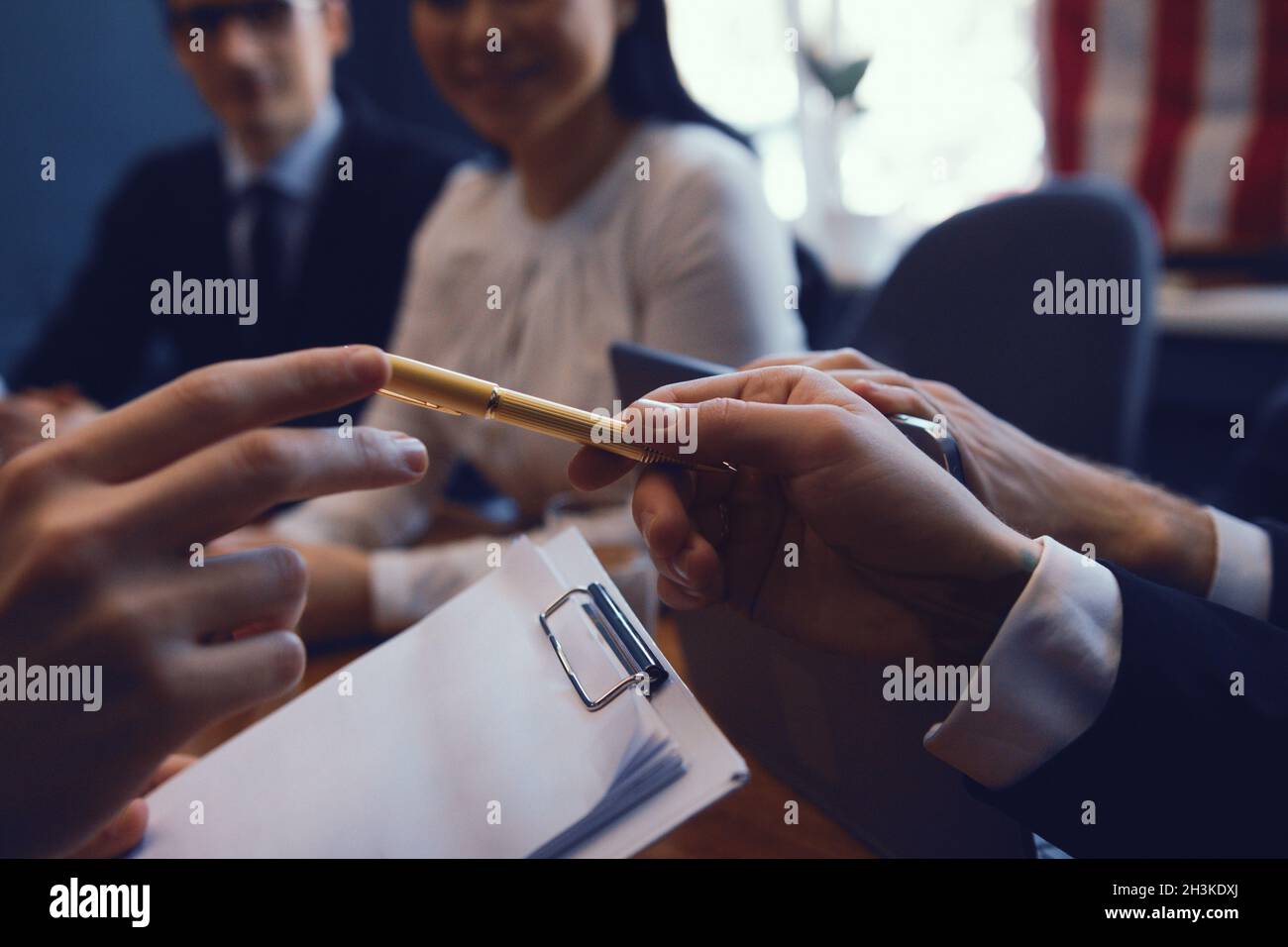 Group of business people having discussion Stock Photo - Alamy