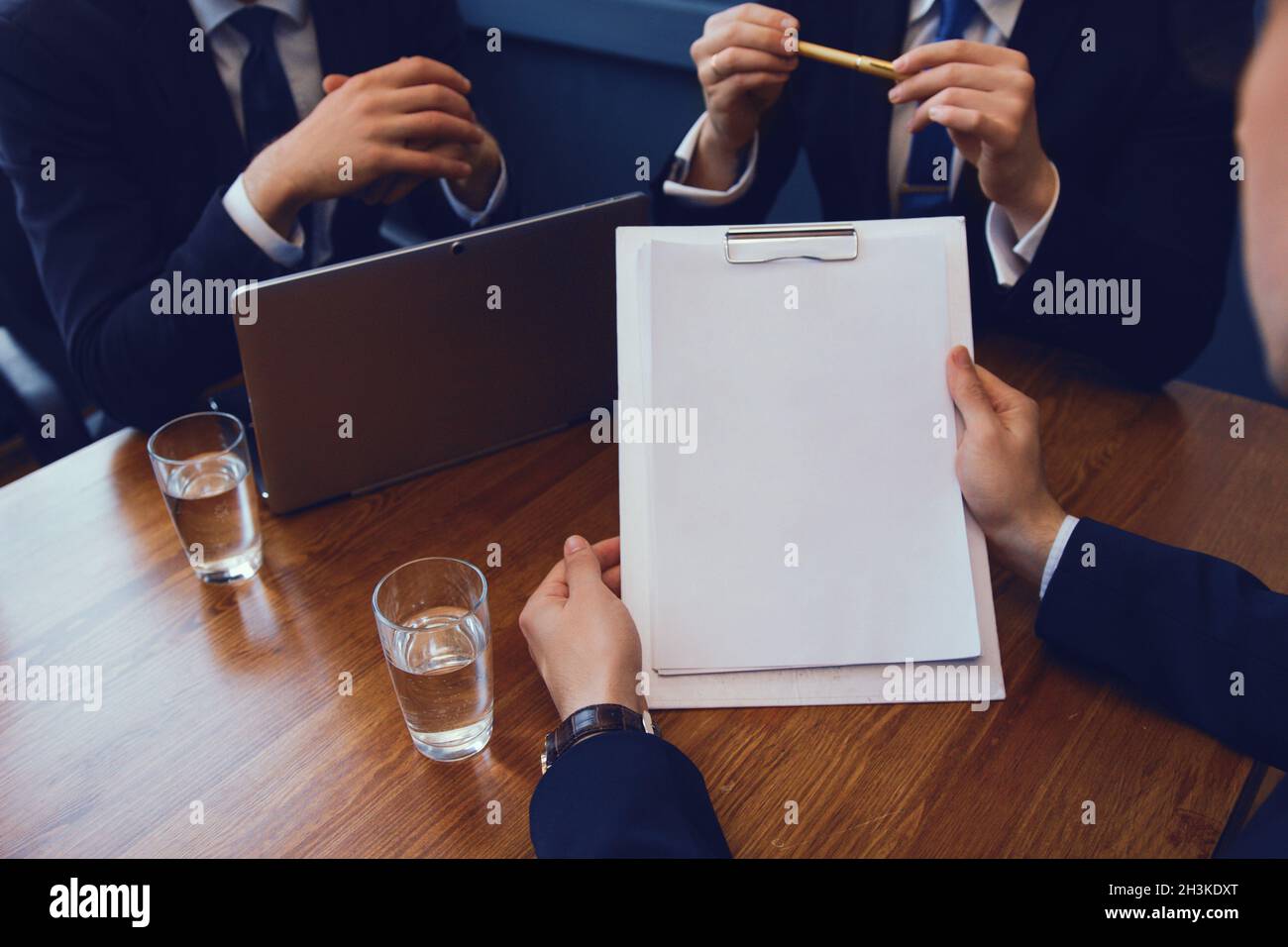 Group of business people having discussion Stock Photo - Alamy