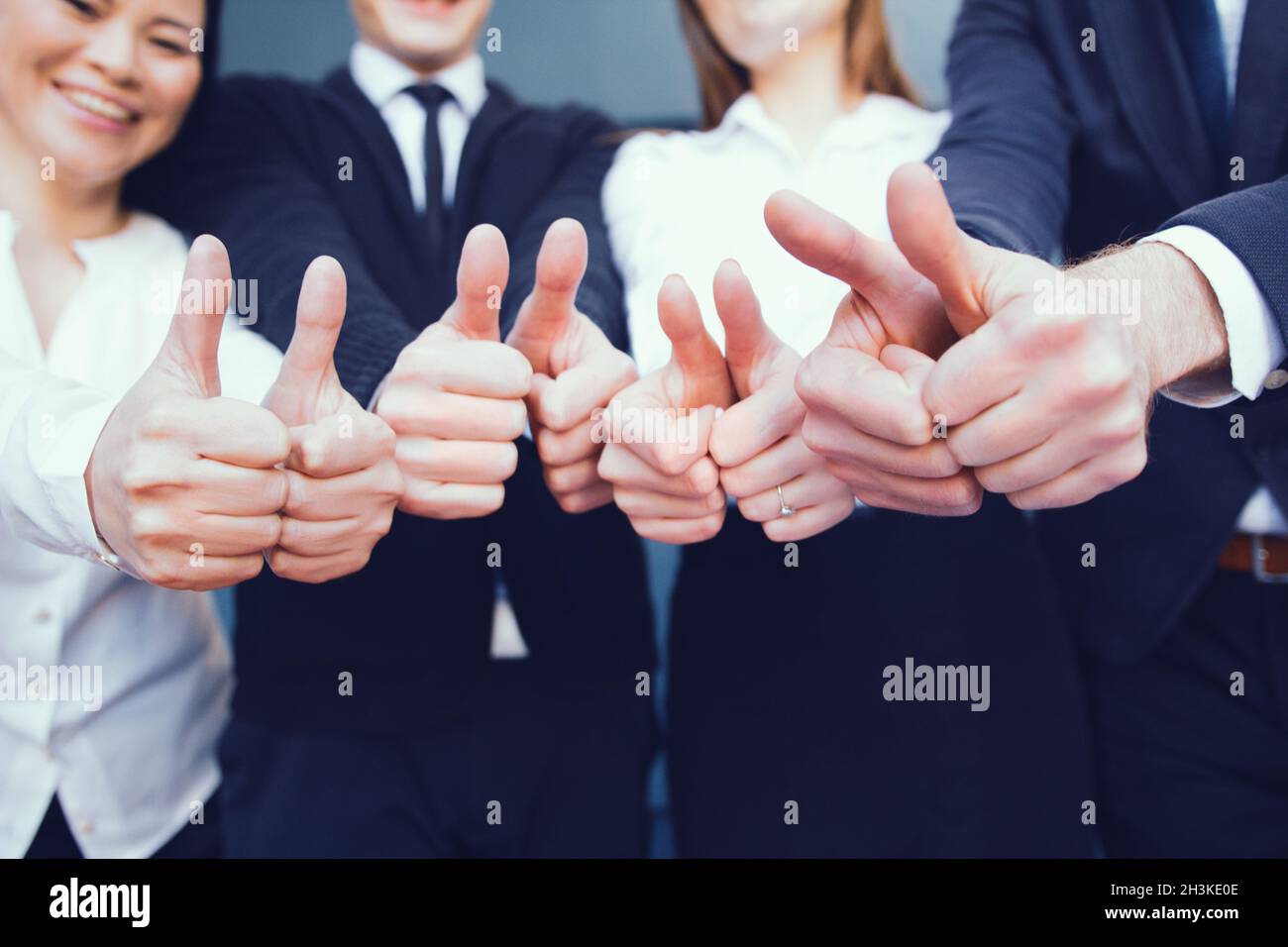 Group women showing thumbs up hi-res stock photography and images - Alamy