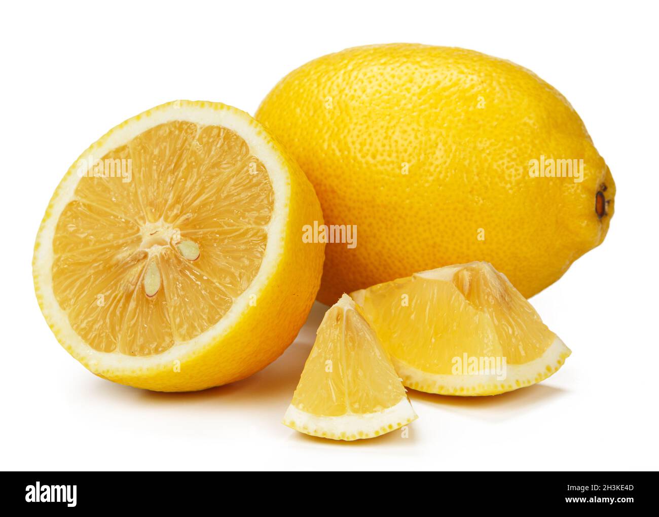 Cut lemon slice isolated on white background Stock Photo - Alamy