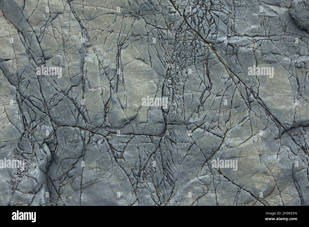 Natural stone background with cracks. Close up view Stock Photo - Alamy