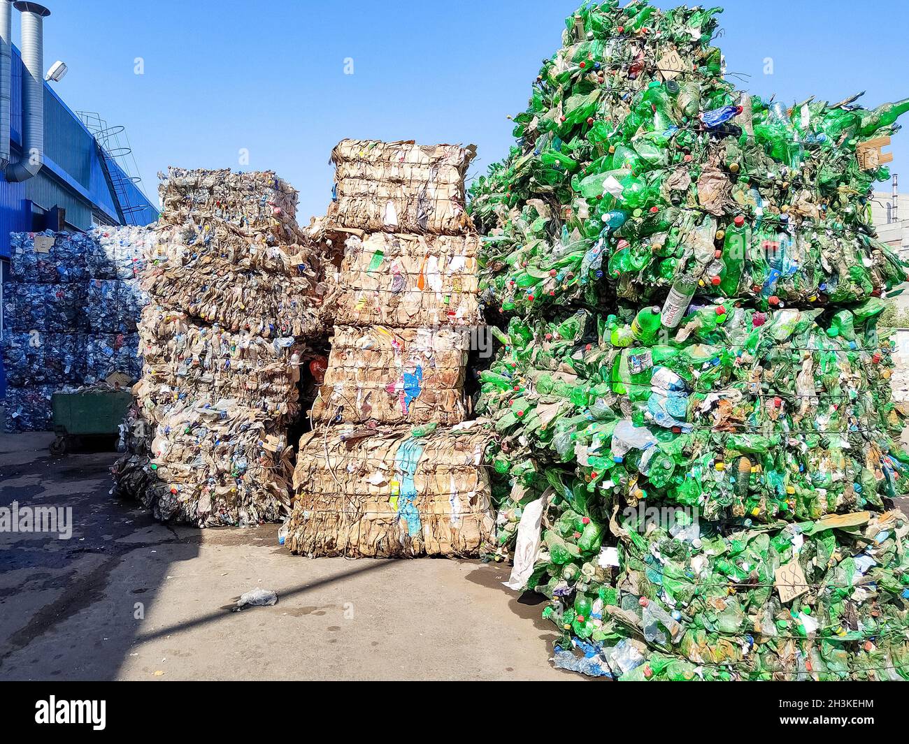 Recycled used plastic bottles in bales at a recycling facility Stock ...