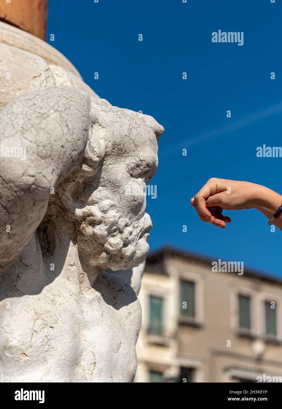 Noseless Telamon statue on city flagpole, Corso del Popolo, Chioggia ...