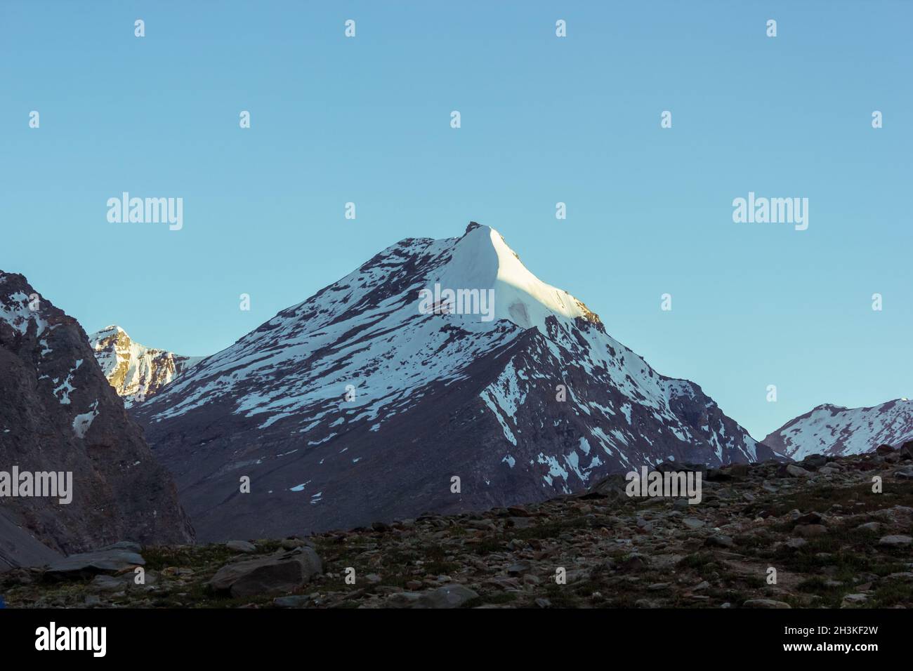 A snow capped mountain peak of the Zanskar range Stock Photo - Alamy