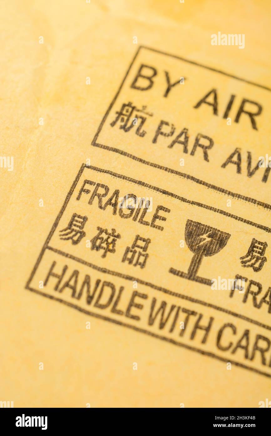 Chinese Par Avion airmail label on yellow-brown envelope shipment ...