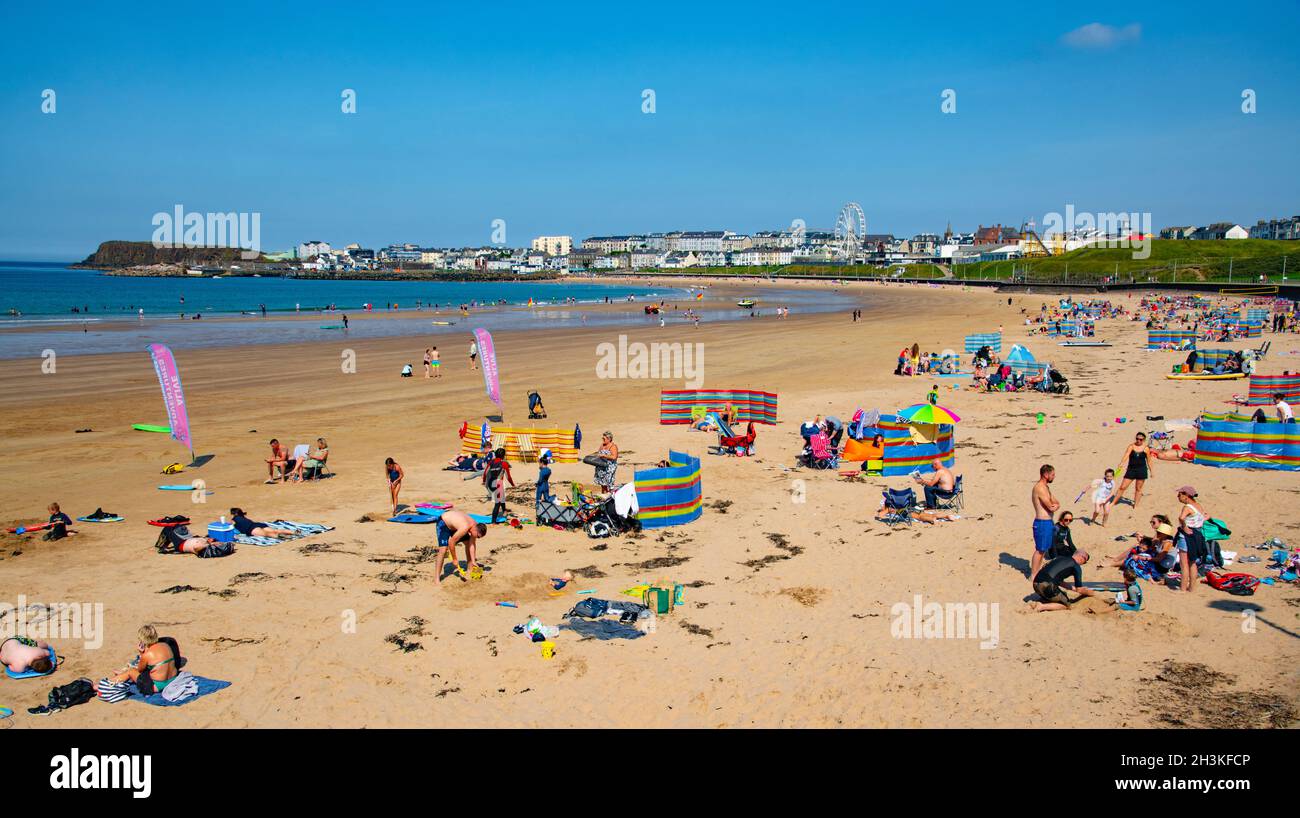 Summertime photo of the West Strand at Portrush, County Antrim ...