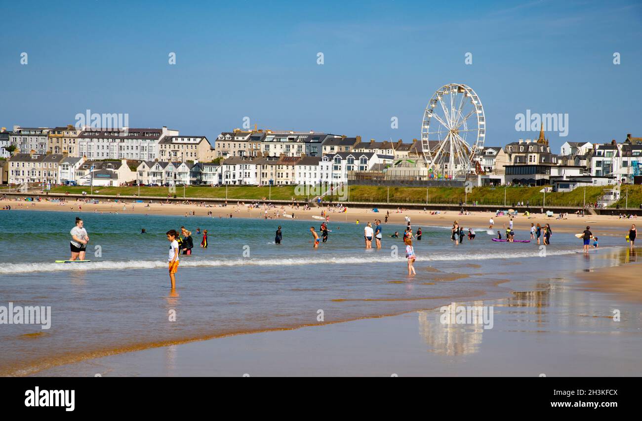 Summertime photo of the West Strand at Portrush, County Antrim ...