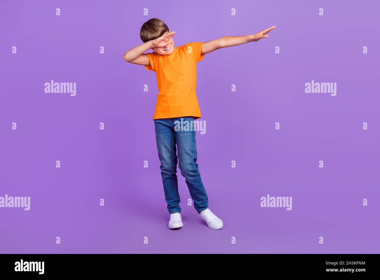Full length body size photo boy in stylish outfit dancing showing dab ...