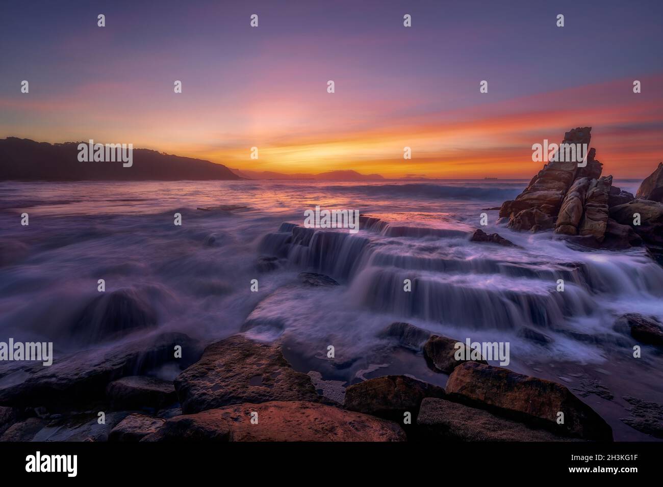 amazing sunset in barrika beach, located in Bizkaia, Basque Country. in ...