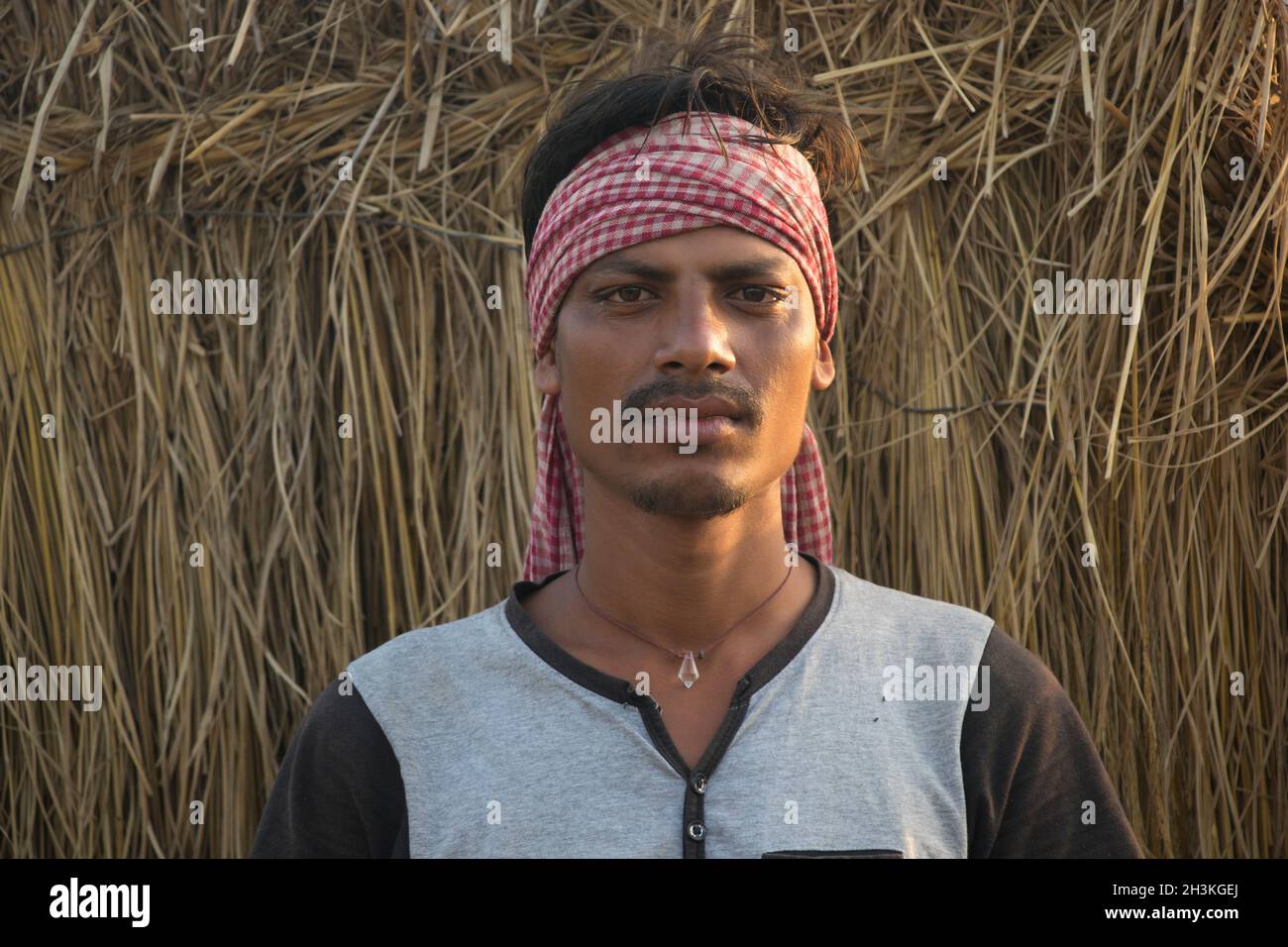 Indian Rural man Holding mobile phone Stock Photo - Alamy