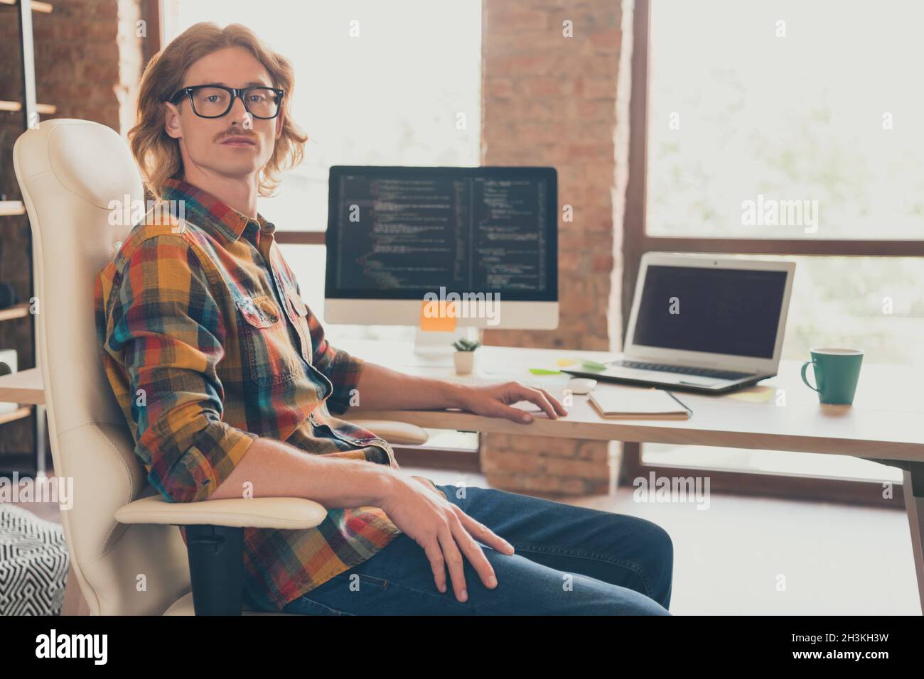 Profile side photo of young man programmer sit chair office wear ...