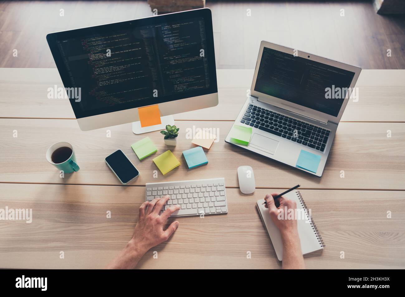 Cropped photo of young man hands work laptop computer screen write ...