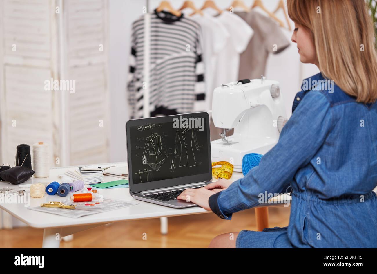Young seamstress woman in hi-res stock photography and images - Alamy