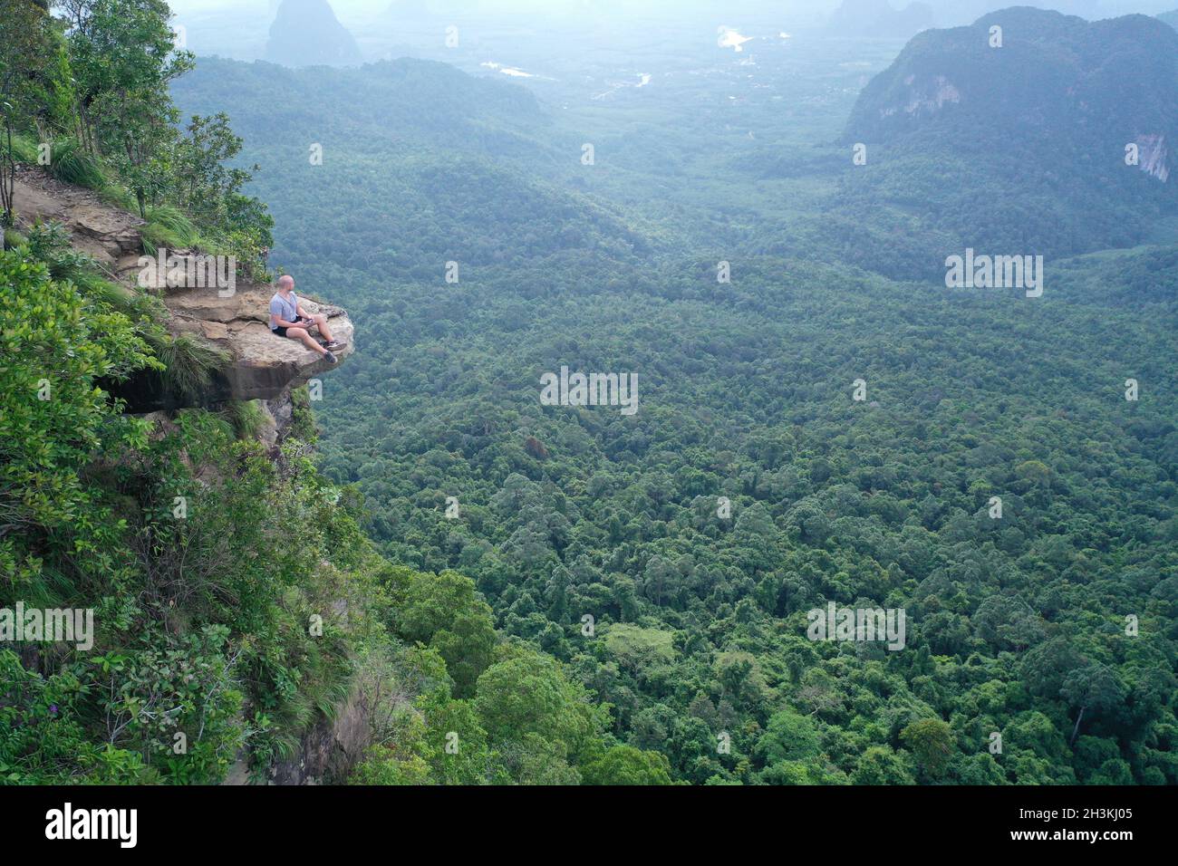 Aerial view of man on the mountain view point Stock Photo - Alamy