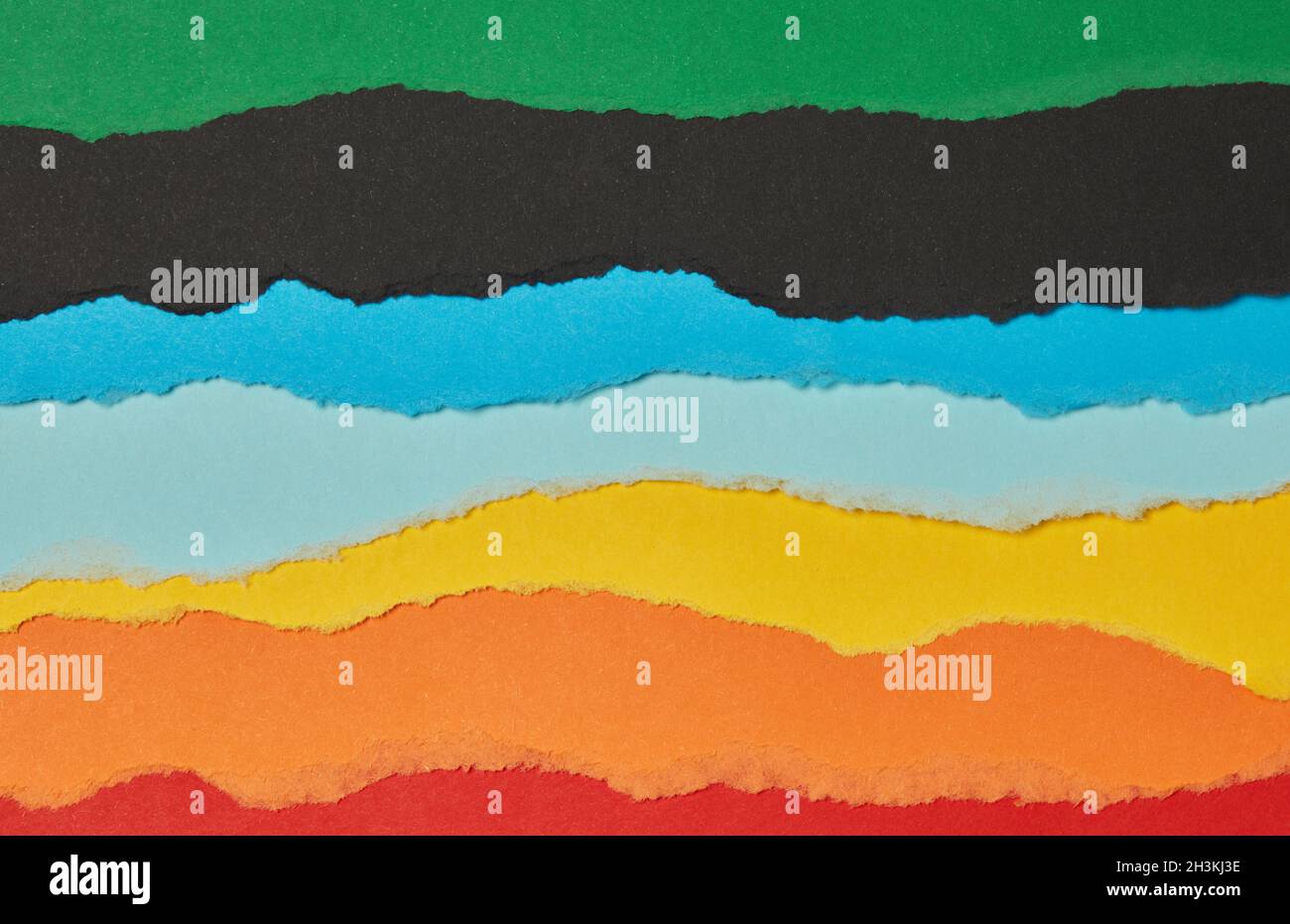 Multi-colored torn paper background Stock Photo - Alamy
