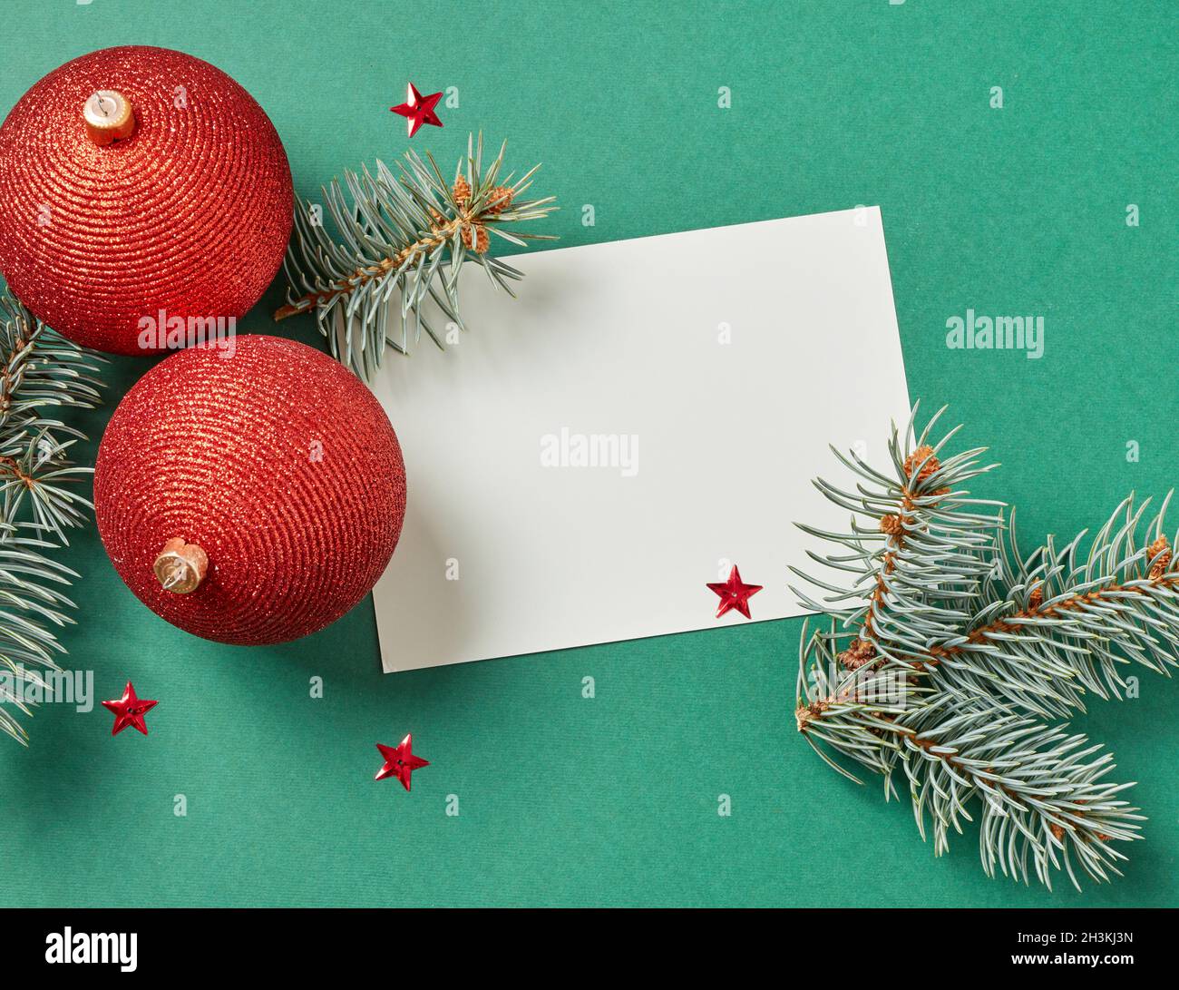 Christmas balls and blank paper Stock Photo - Alamy