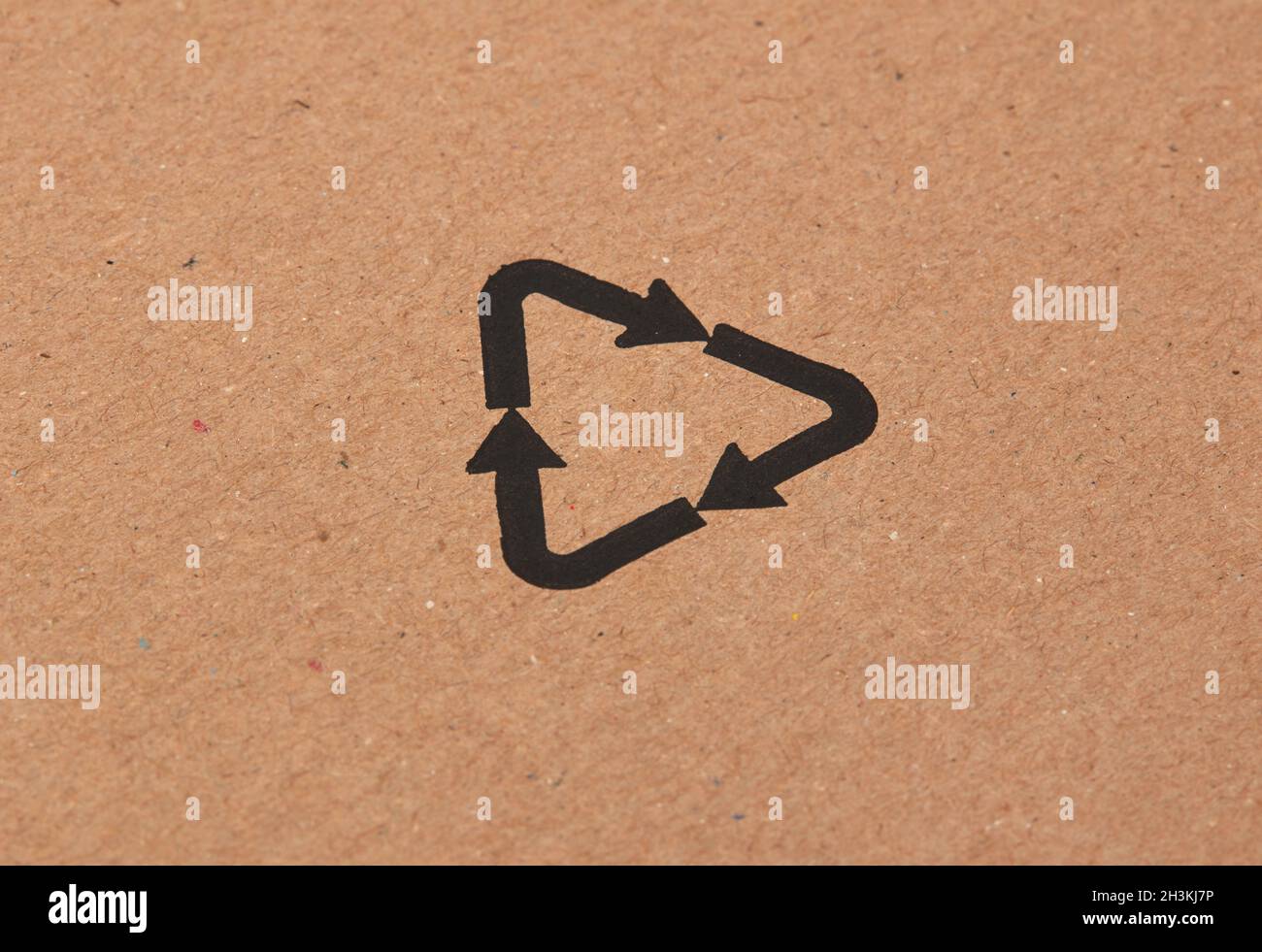 Recycle symbols on cardboard Stock Photo - Alamy