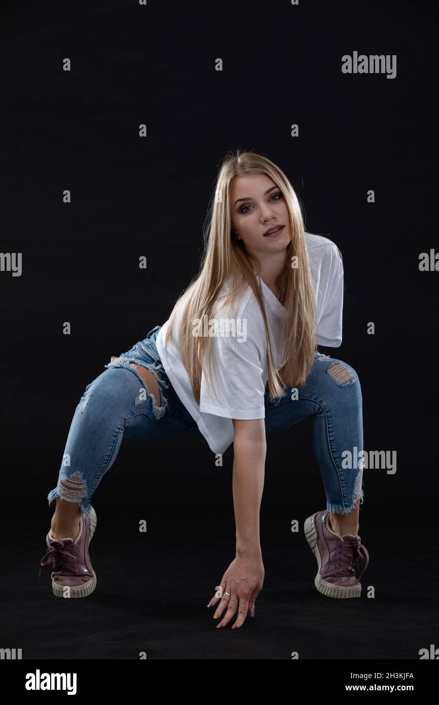 Woman Crouching Down Isolated High Resolution Stock Photography and ...